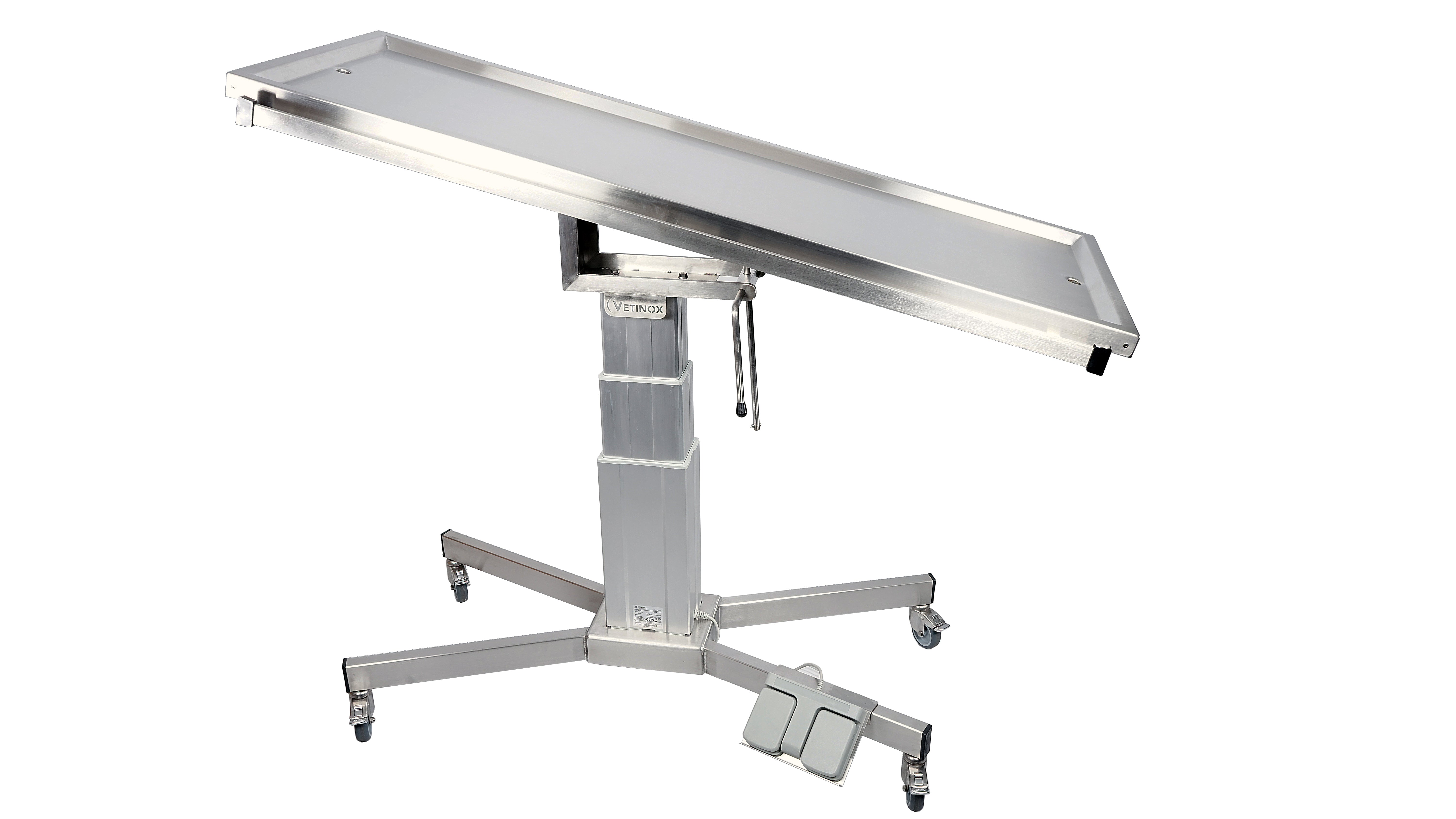 Surgical X-base table with two drain outlets 4 wheels with lock mechan ...
